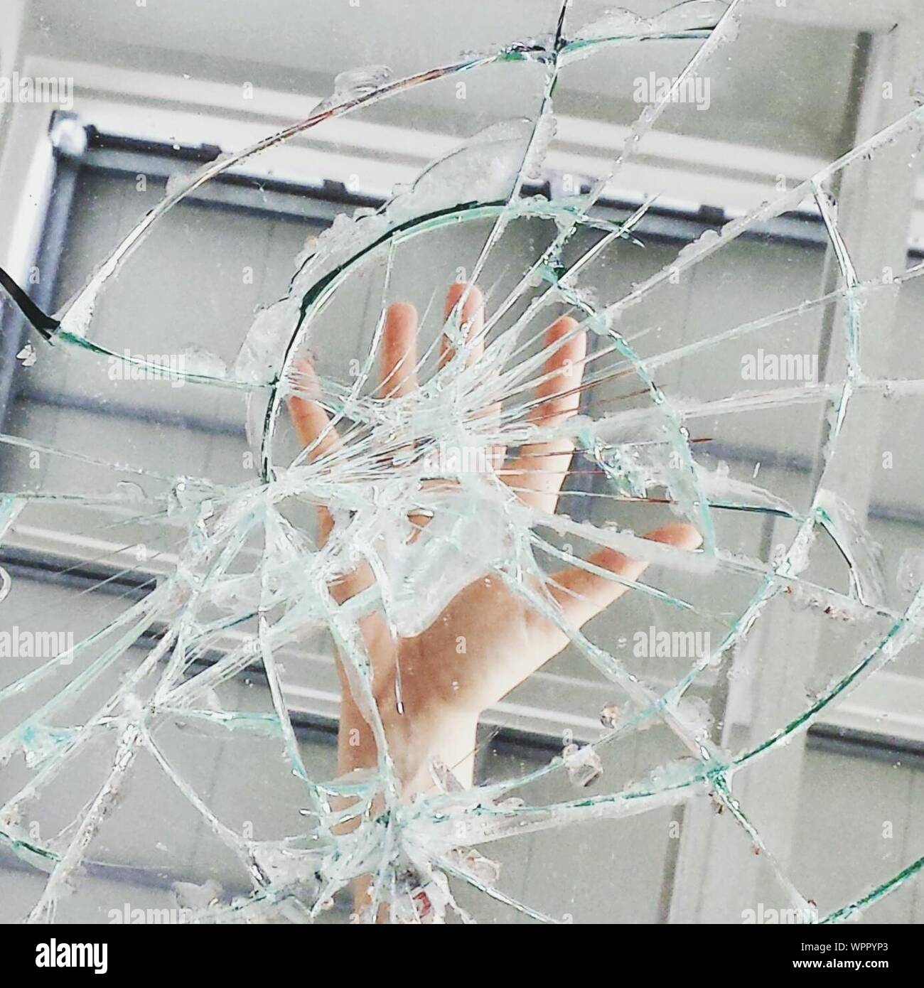 Reflection on cracked mirror hi-res stock photography and images - Alamy