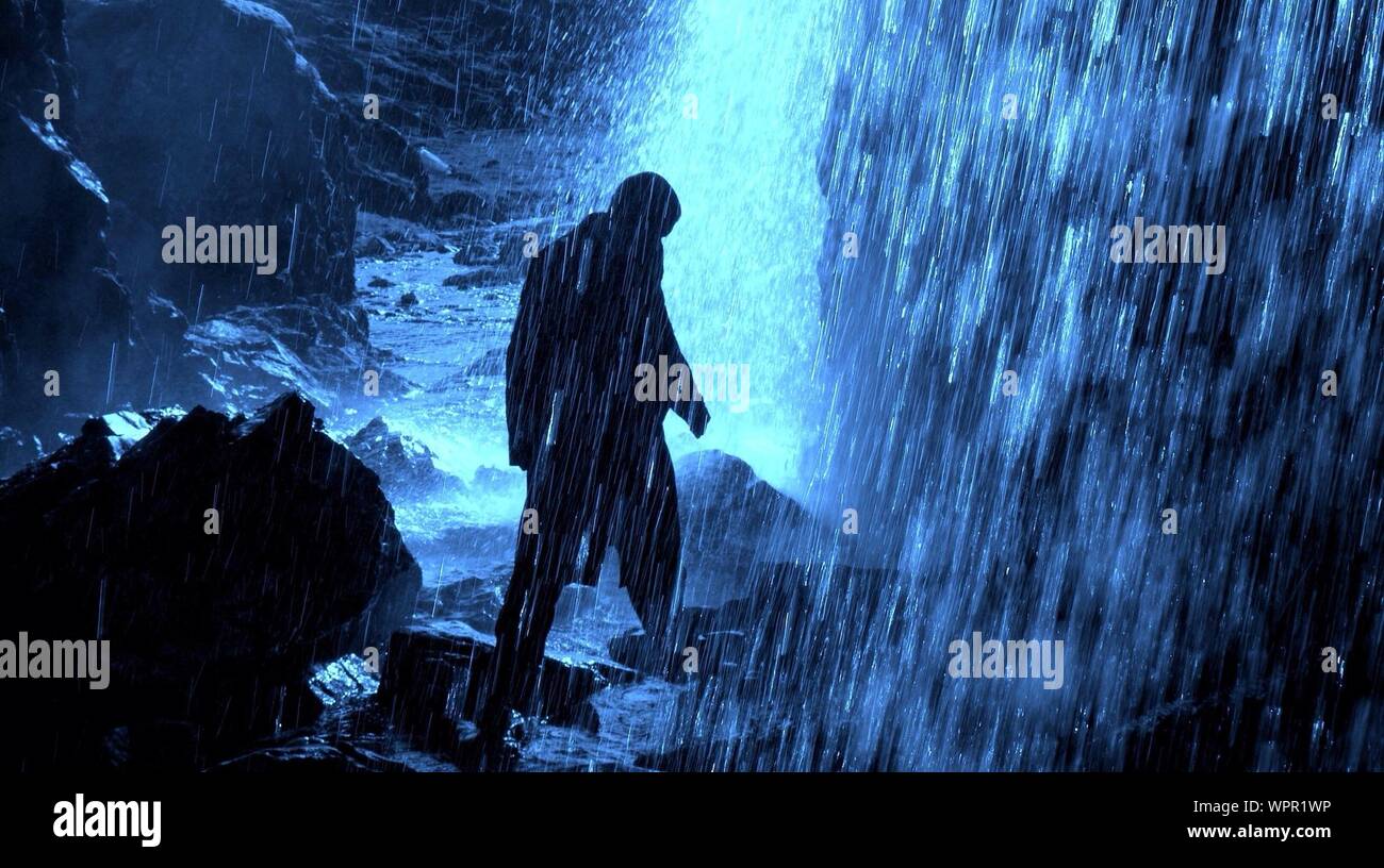 Person under waterfall hi-res stock photography and images - Alamy