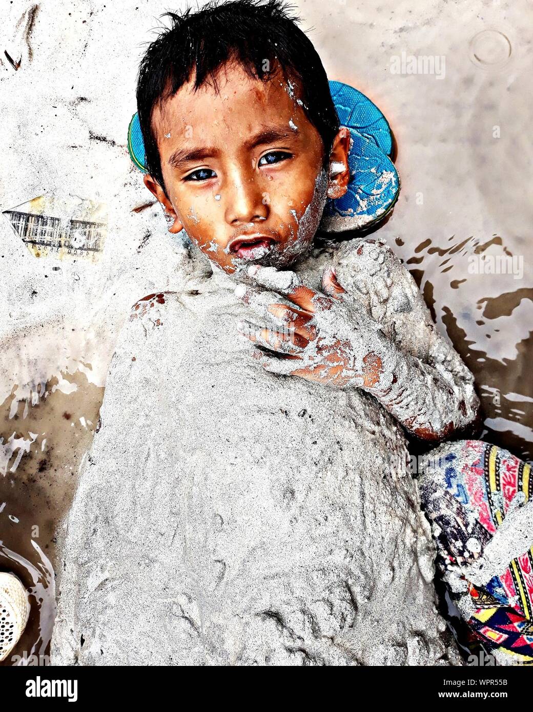 People buried in sand hi-res stock photography and images - Alamy