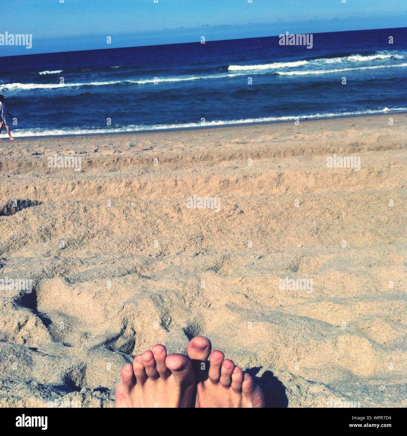 Human feet on the beach in summer hi-res stock photography and images ...