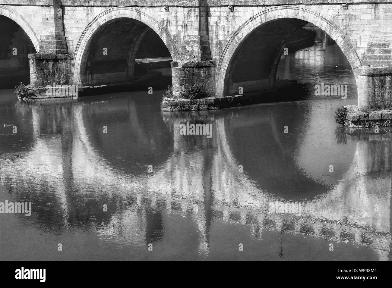 Bridge reflection in the water Black and White Stock Photos & Images ...