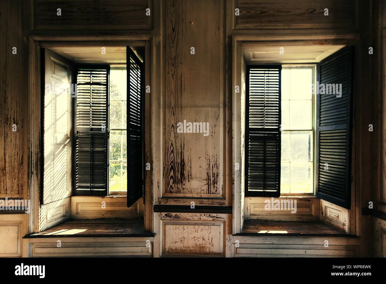 Old house sunlight shutters interior hi-res stock photography and ...