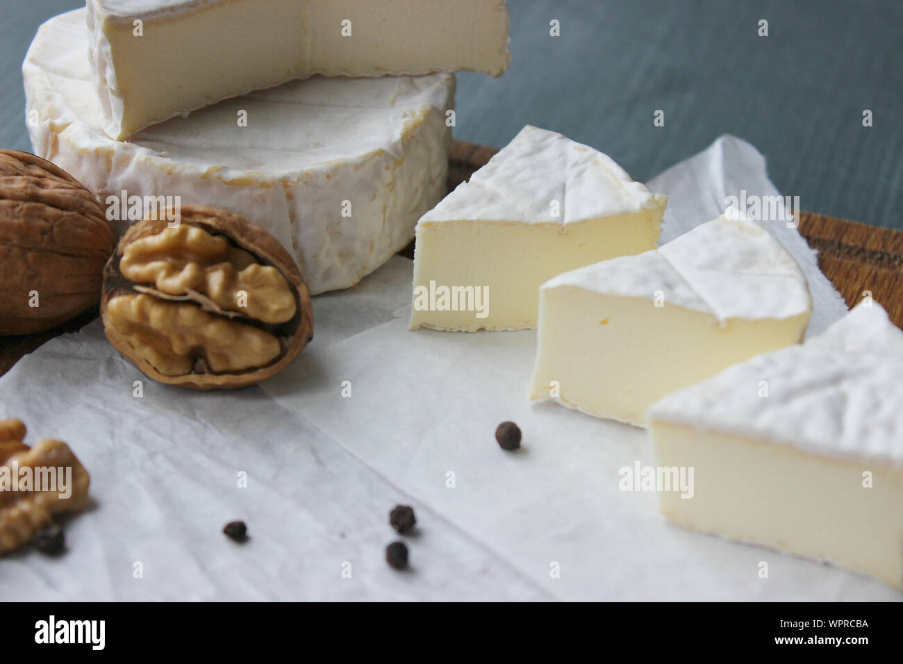 Camembert cheese. Farm products, rustic cheese. Copy space Stock Photo ...