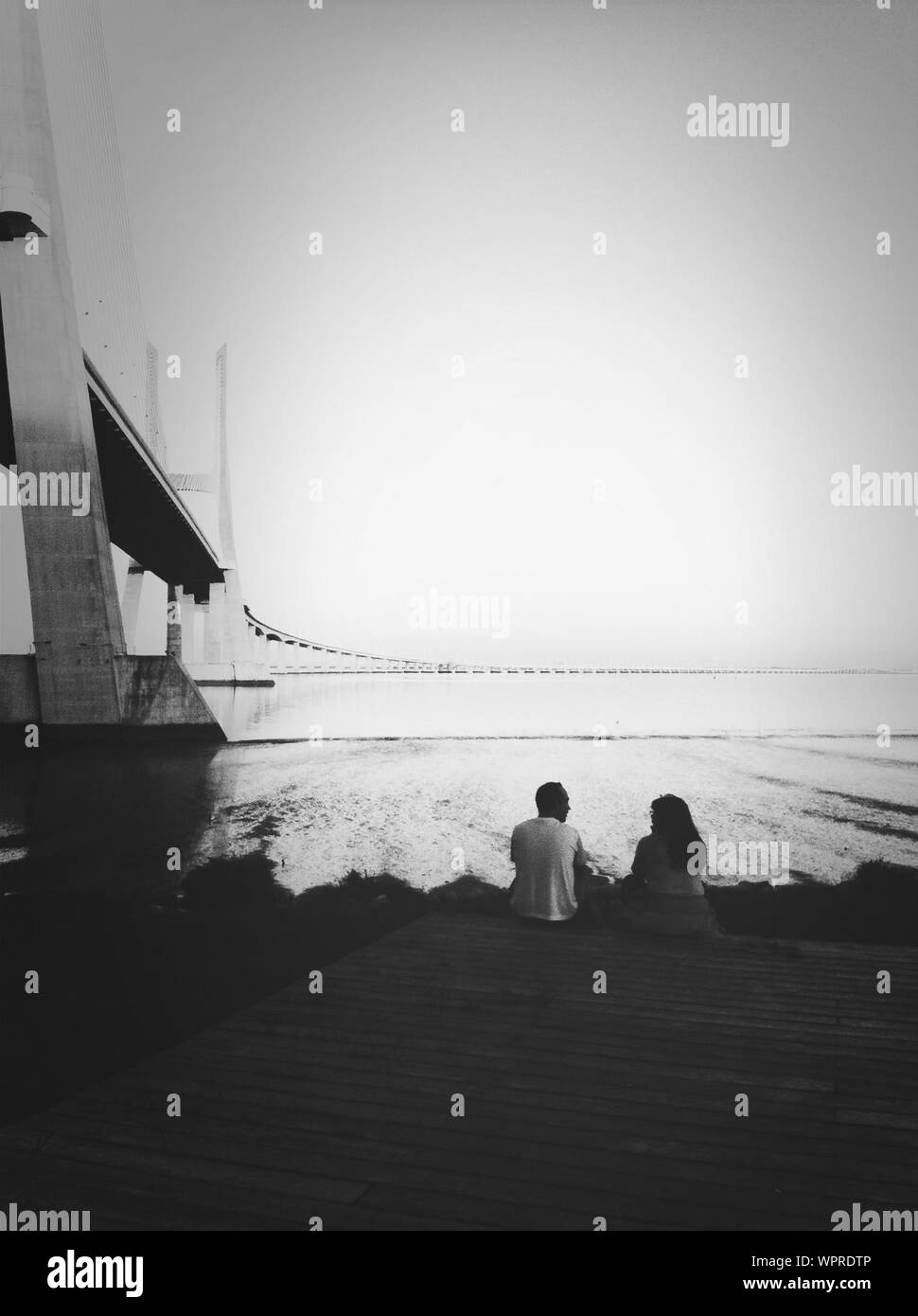 Man sitting under bridge hi-res stock photography and images - Alamy