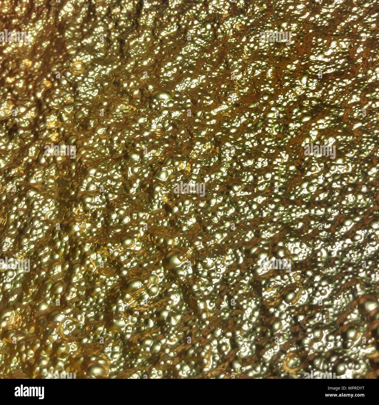 Melted gold hi-res stock photography and images - Alamy