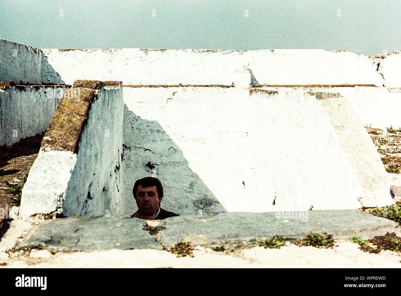 Man On Building Terrace Stock Photo - Alamy