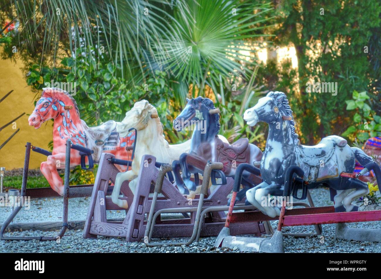 Playground horse rocking hi-res stock photography and images - Alamy