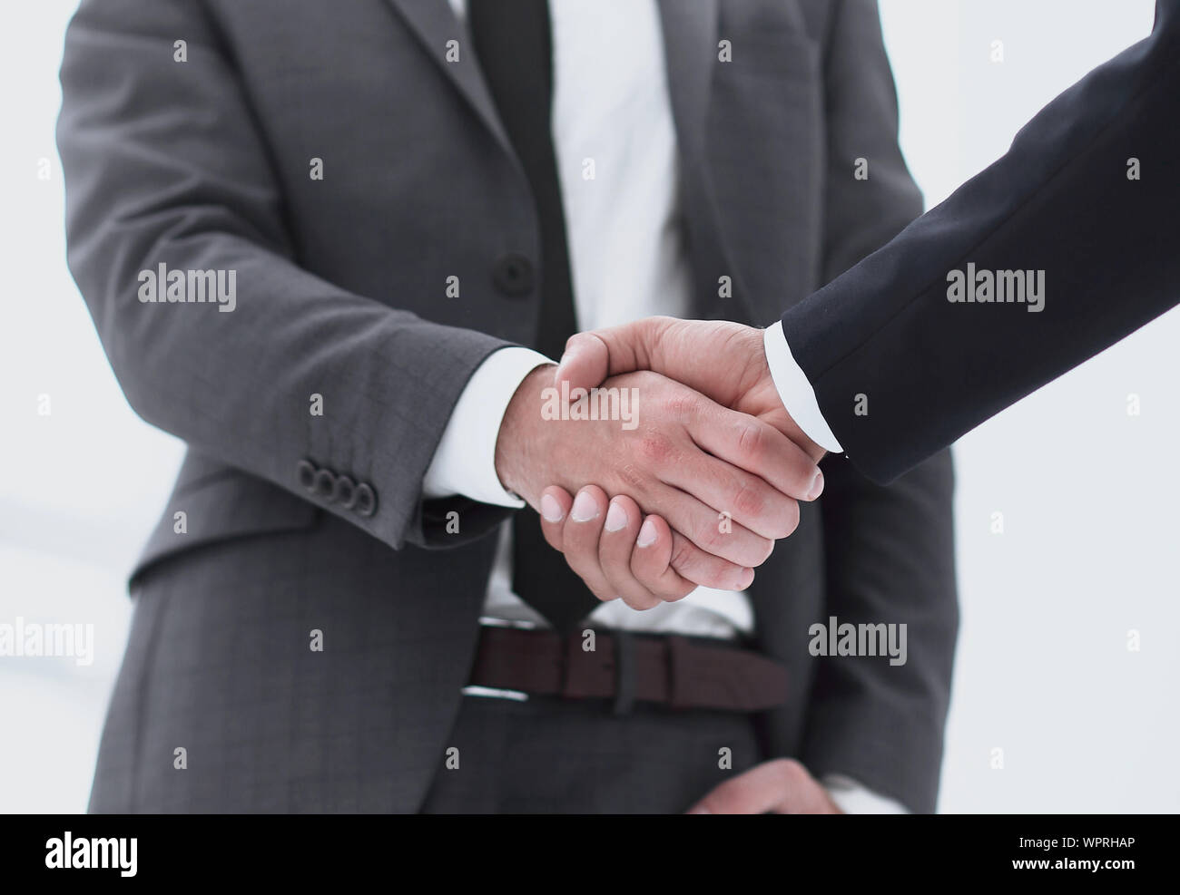 Businessman Offering Handshake in meeting room. Success Concept Stock ...