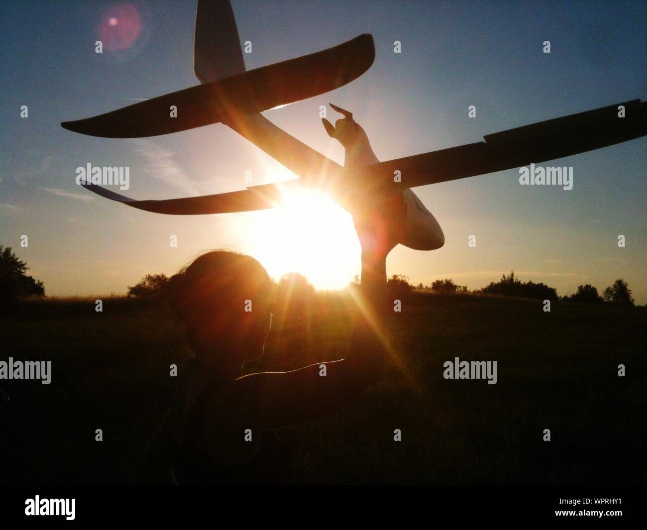 Holding Aloft High Resolution Stock Photography and Images - Alamy