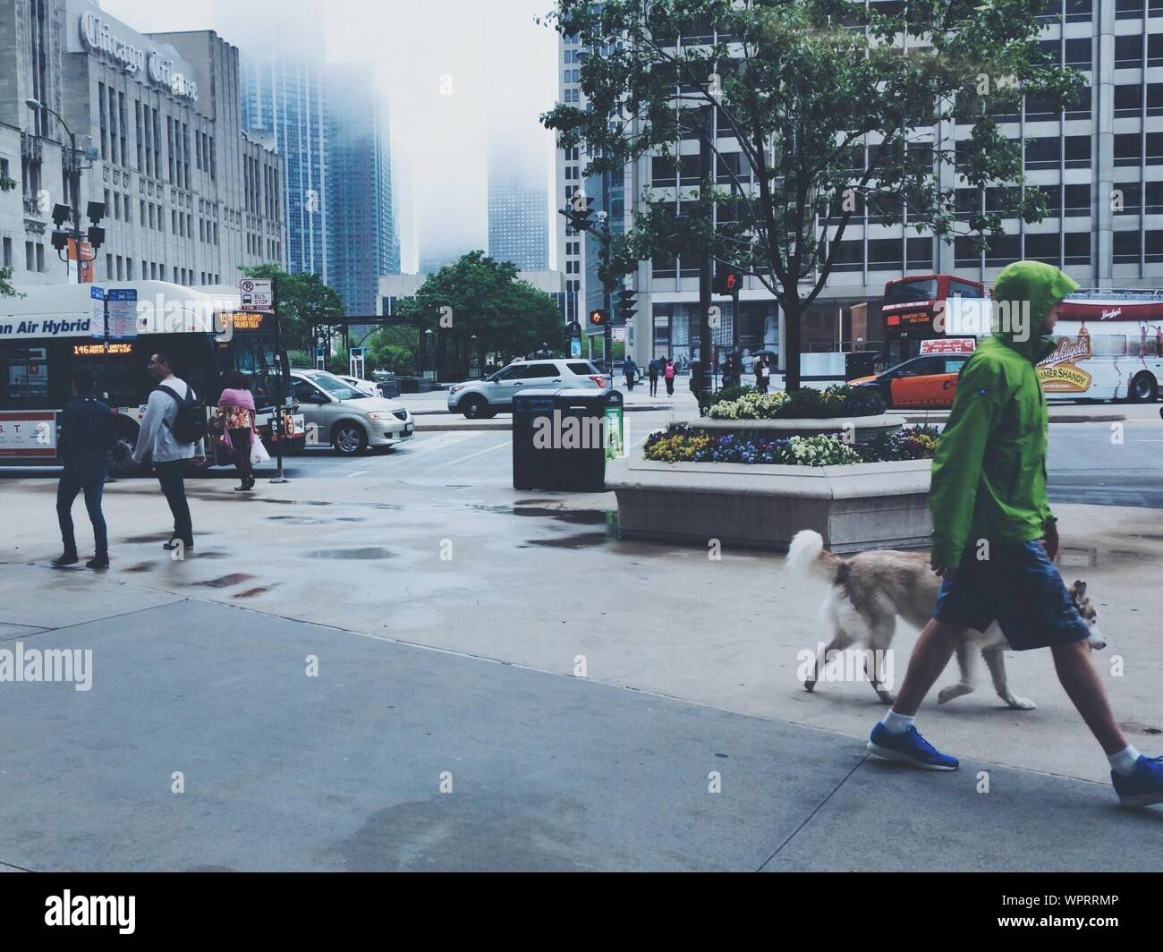 Cityscape with people walking on the street hi-res stock photography ...