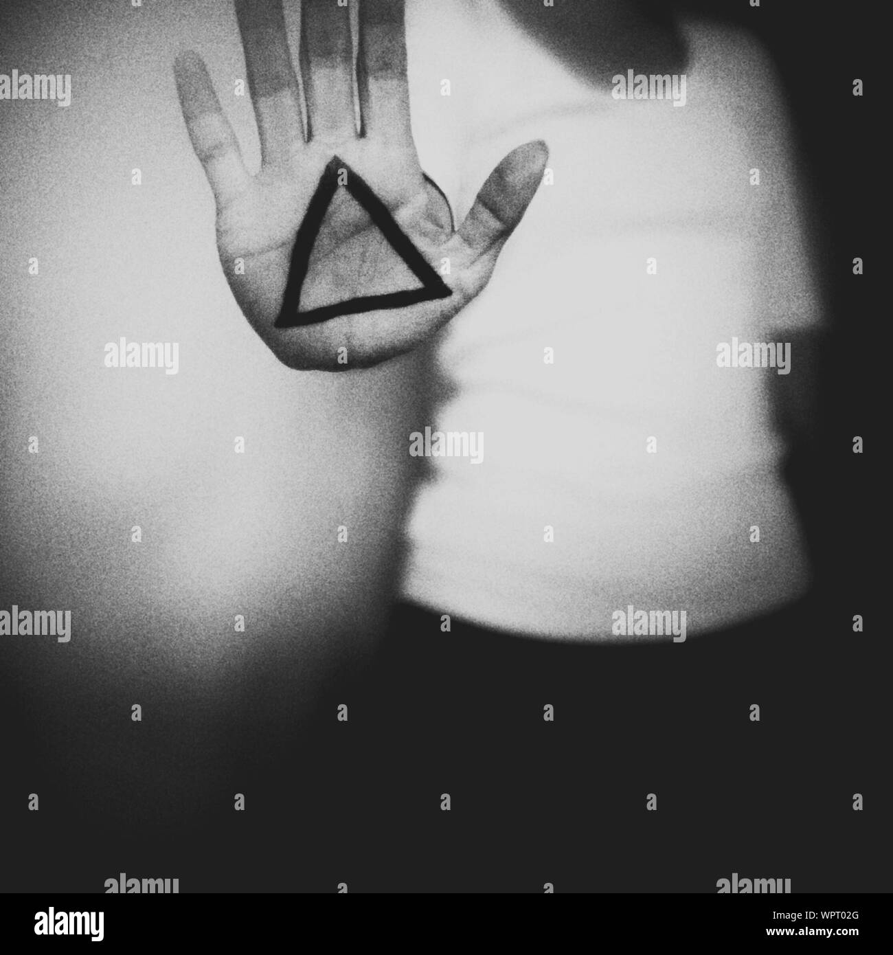 Hand triangle hi-res stock photography and images - Alamy