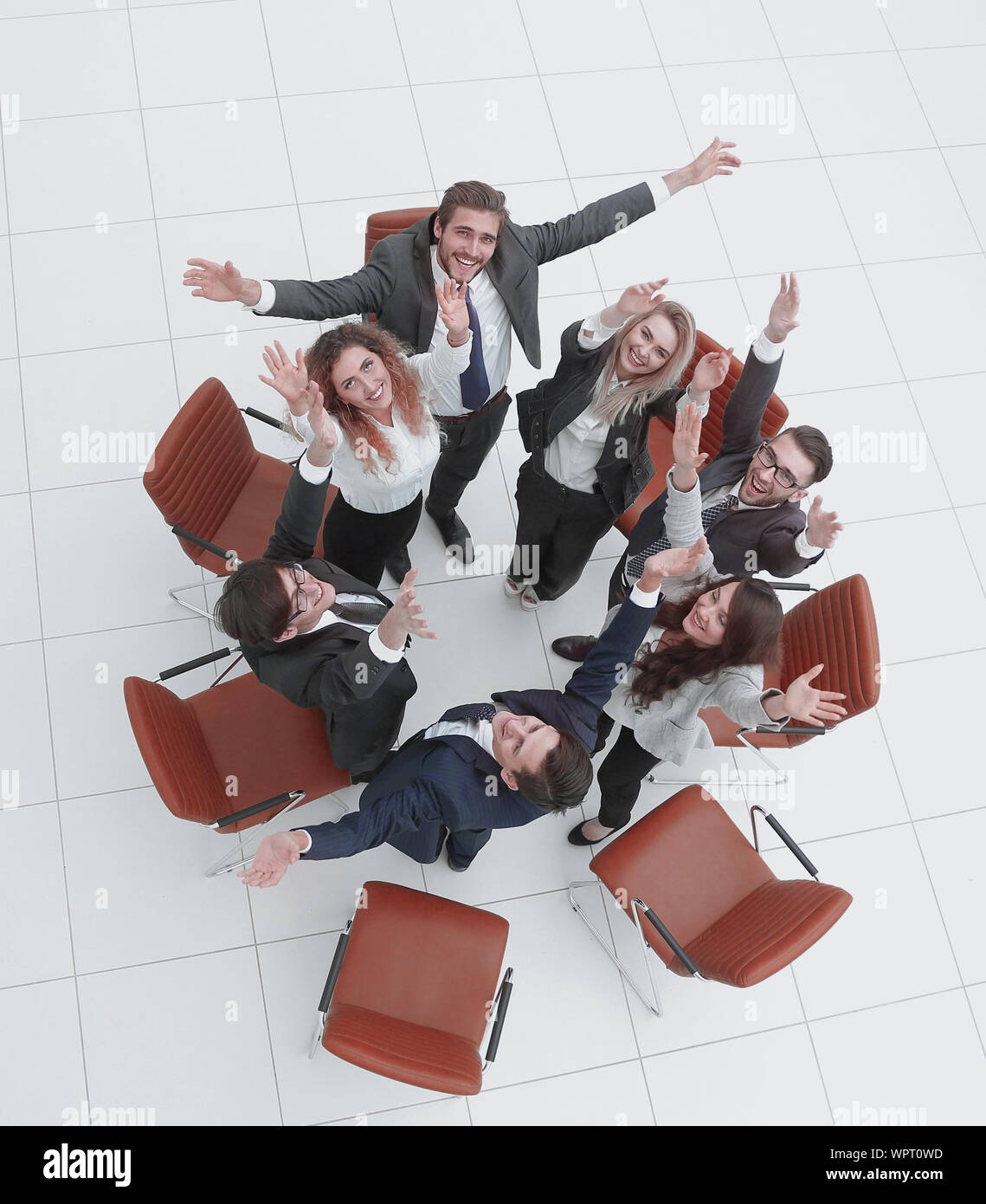 business team with their hands up.photo with copy space Stock Photo - Alamy