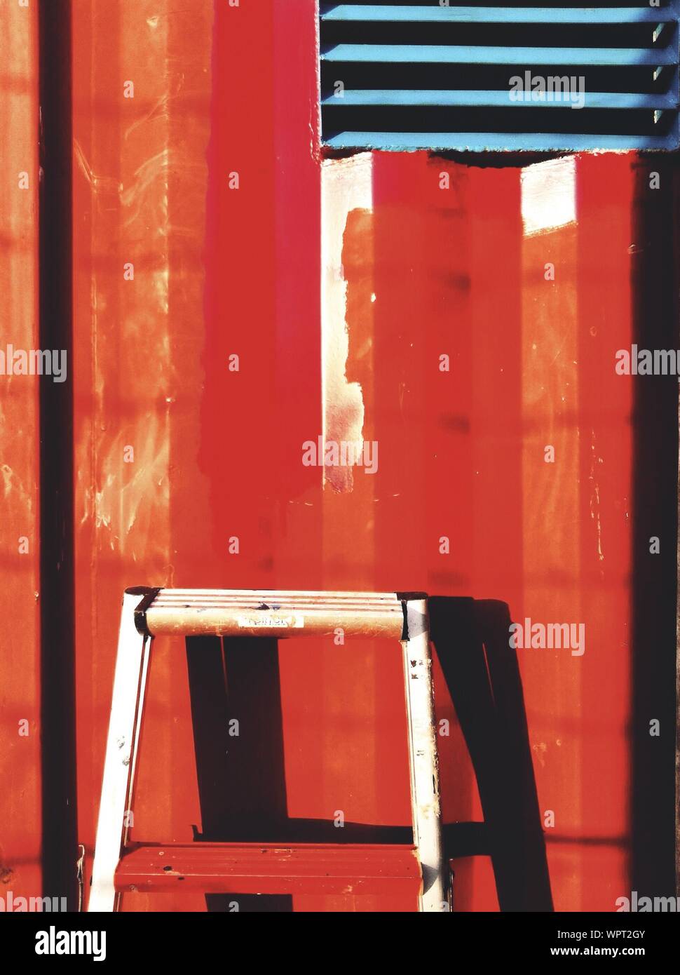 Red wall ladder hi-res stock photography and images - Alamy