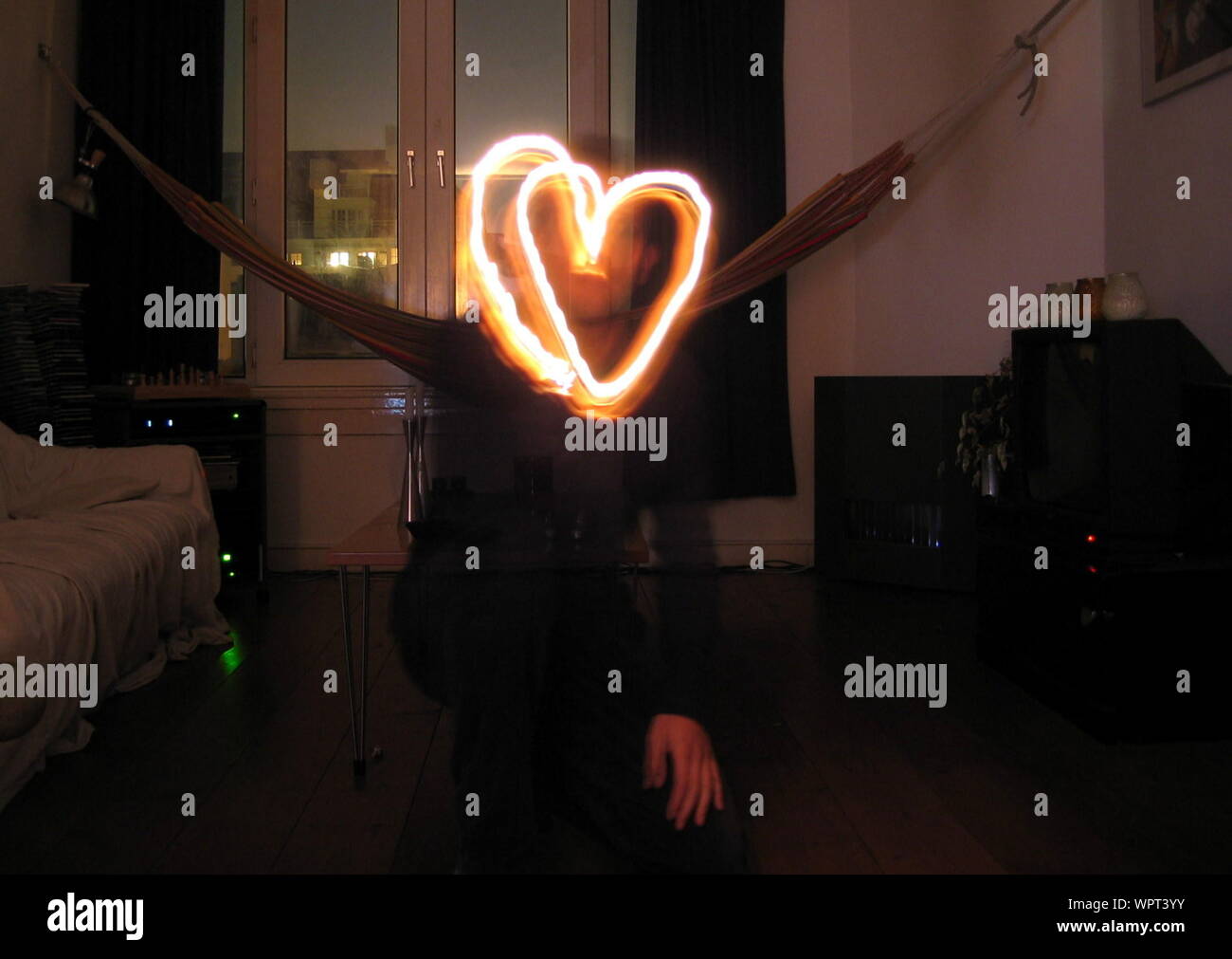Heart shape light painting hi-res stock photography and images - Alamy
