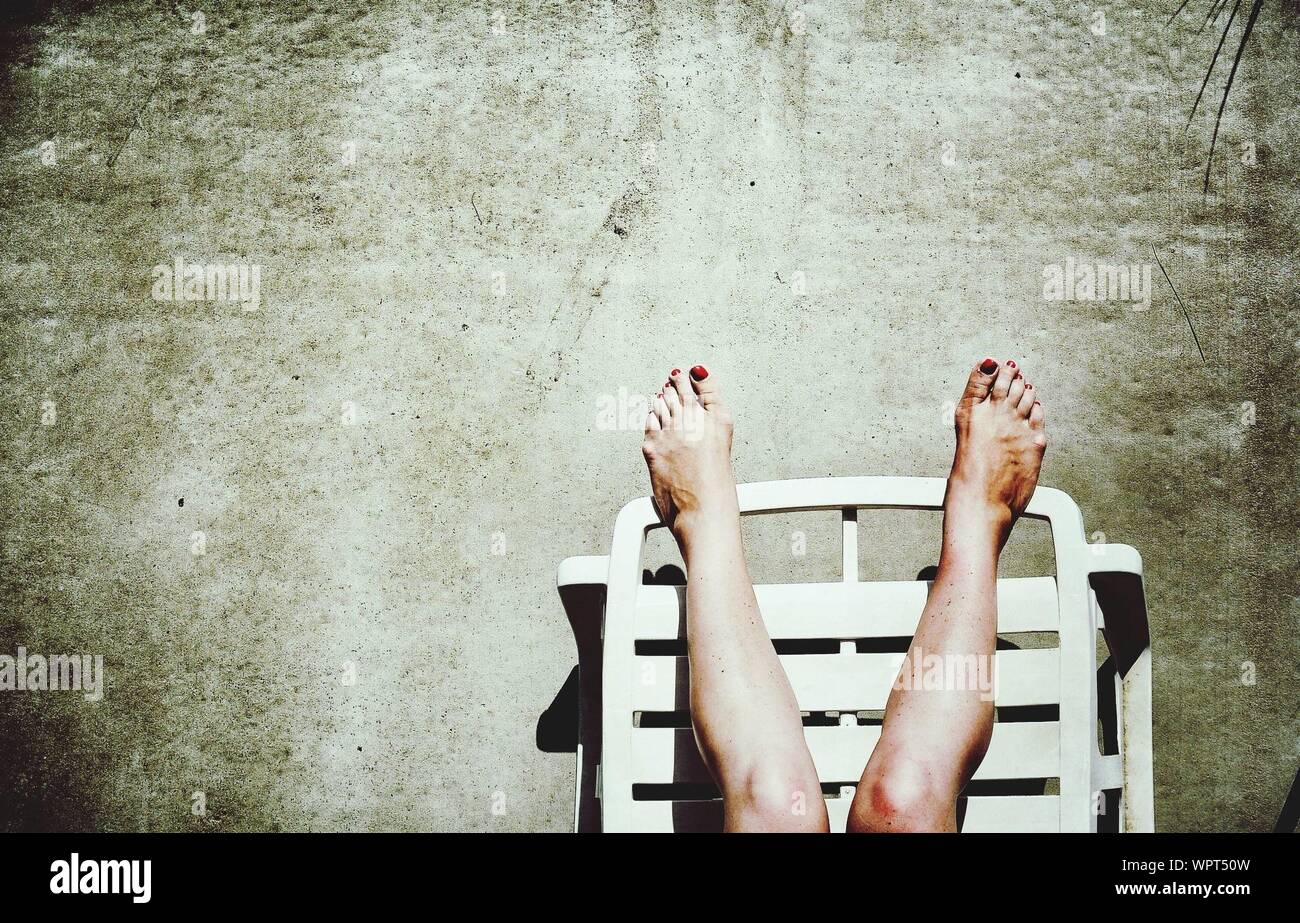 Woman One Leg Up On Chair High Resolution Stock Photography and Images ...