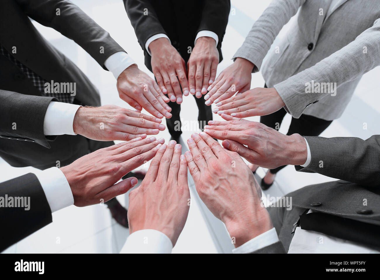closeup.business people giving each other their hands.the concept of ...