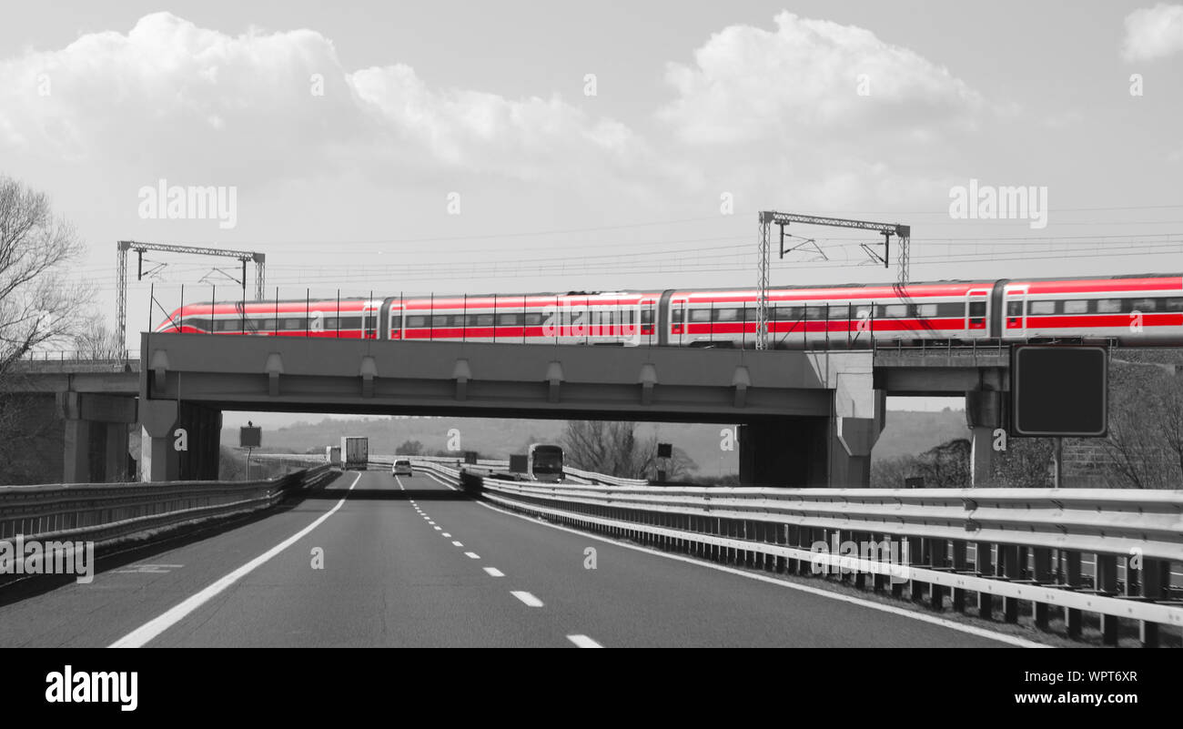 Rome, RM, Italy - March 3, 2019: Red Train over the highway in Central ...