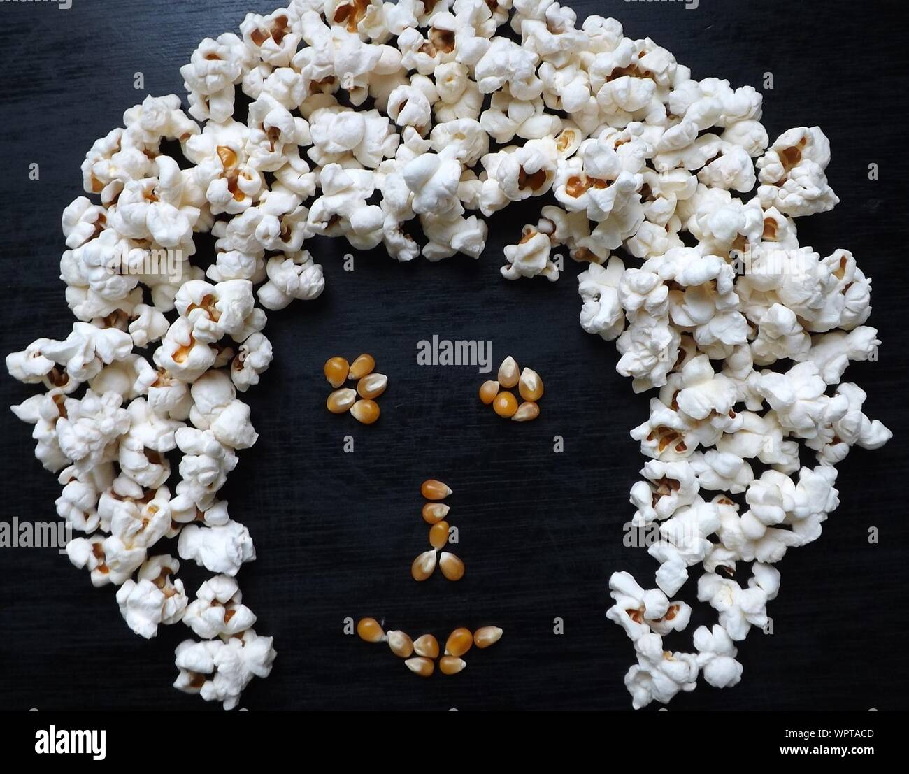 Popcorn human hi-res stock photography and images - Alamy