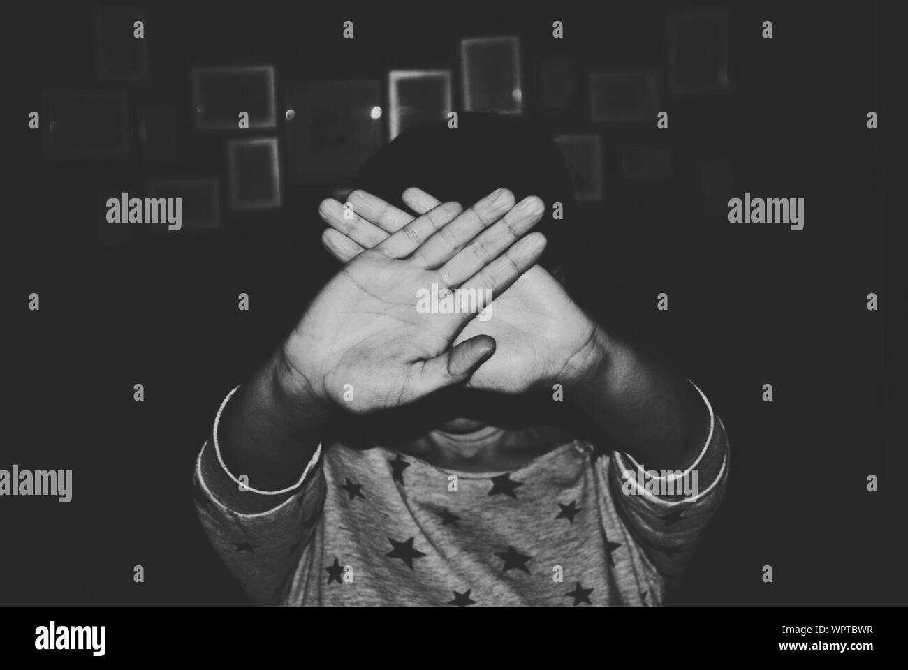 Hiding his embarrassment hi-res stock photography and images - Alamy