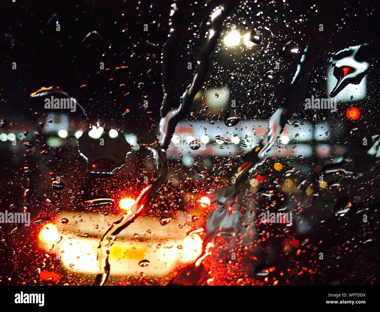 Street lights through rainy window hi-res stock photography and images ...