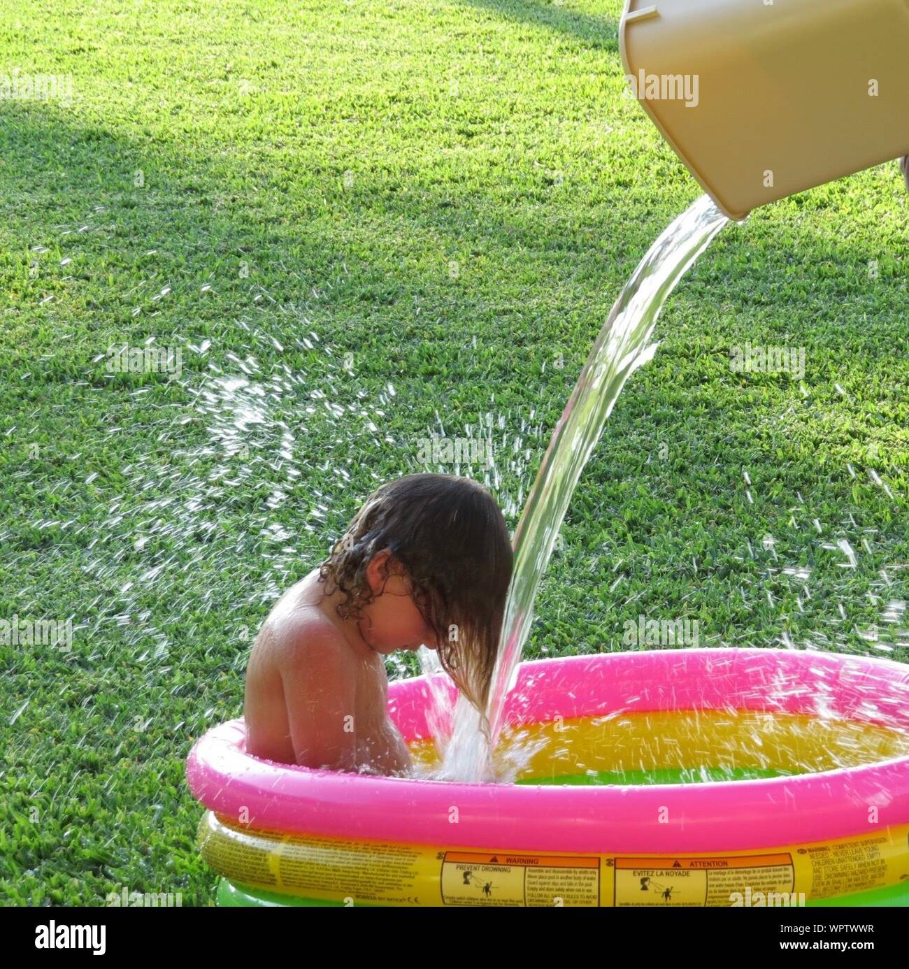 Boy Wading Into Water High Resolution Stock Photography and Images - Alamy