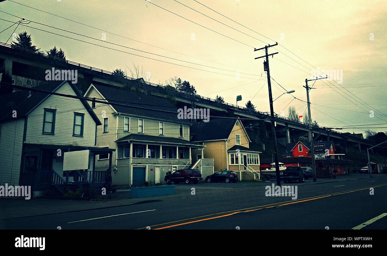Empty Road Along Houses Stock Photo - Alamy