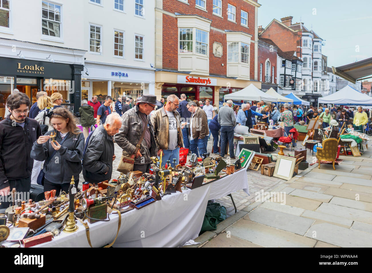 Antiques displayed for sale on a market stall in the Guildford Antique ...