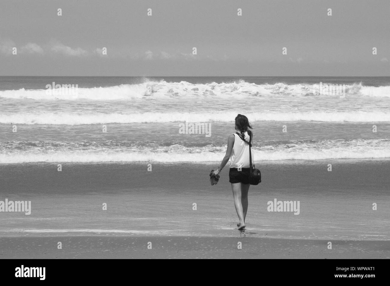 Sandals on beach hi-res stock photography and images - Alamy