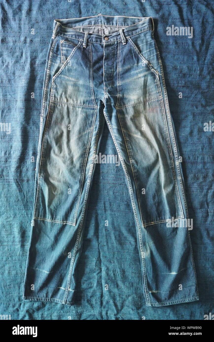 Crumpled blue jeans hi-res stock photography and images - Alamy
