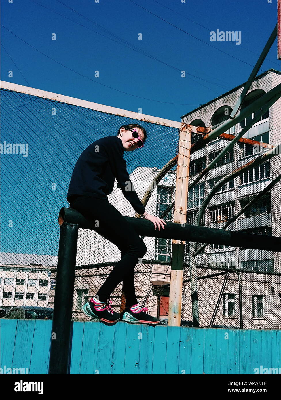 Woman Balancing Fence High Resolution Stock Photography and Images - Alamy