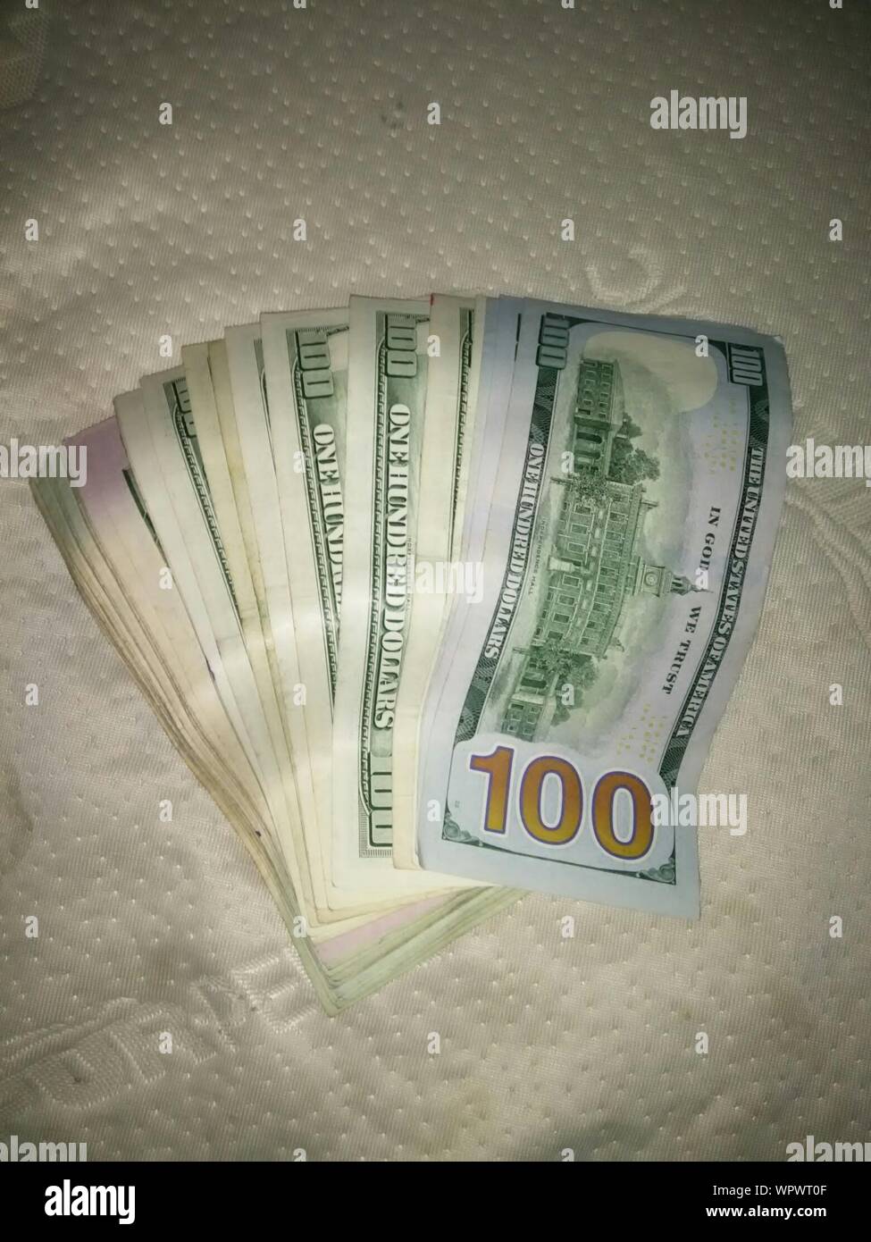 Stack of hundred dollars close up hi-res stock photography and images ...