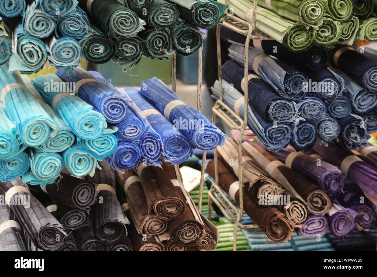 Rolled fabric on display hi-res stock photography and images - Alamy