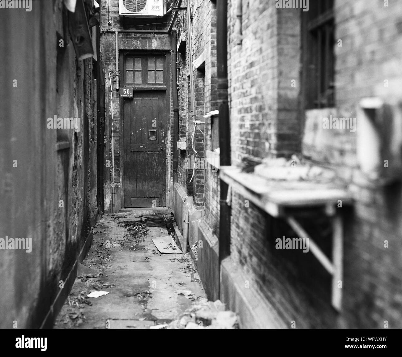 Empty alley between buildings Black and White Stock Photos & Images - Alamy