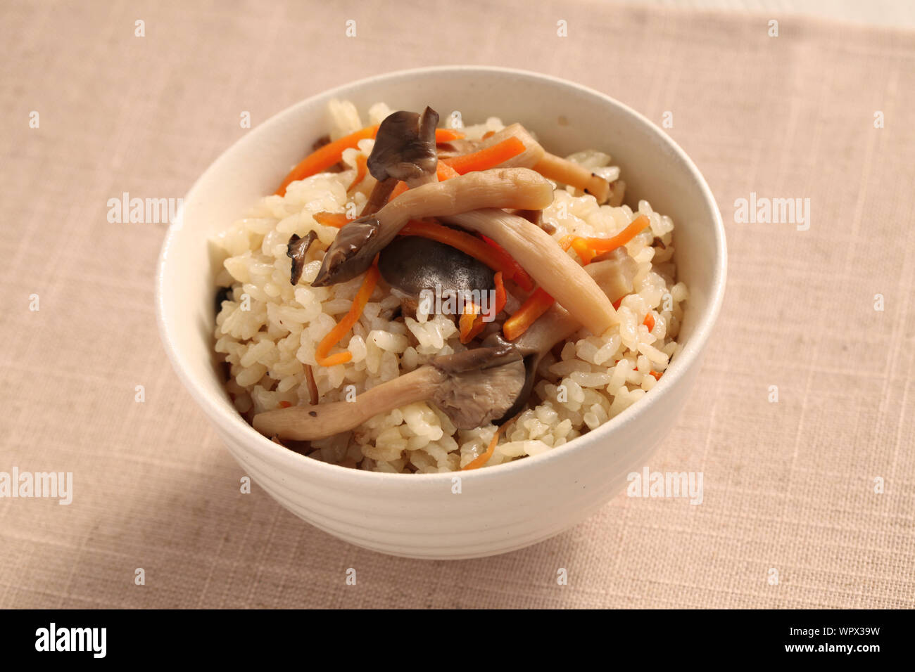 Takikomi gohan Japanese mixed rice with mushrooms closeup isolated on ...