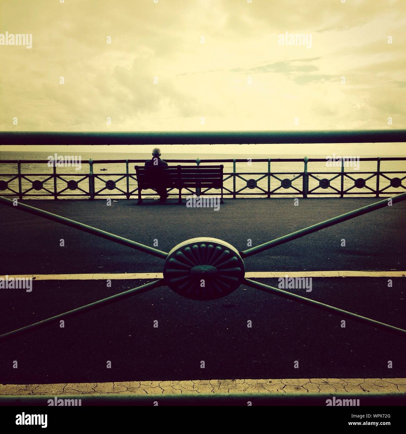 Watching ocean railing hi-res stock photography and images - Alamy