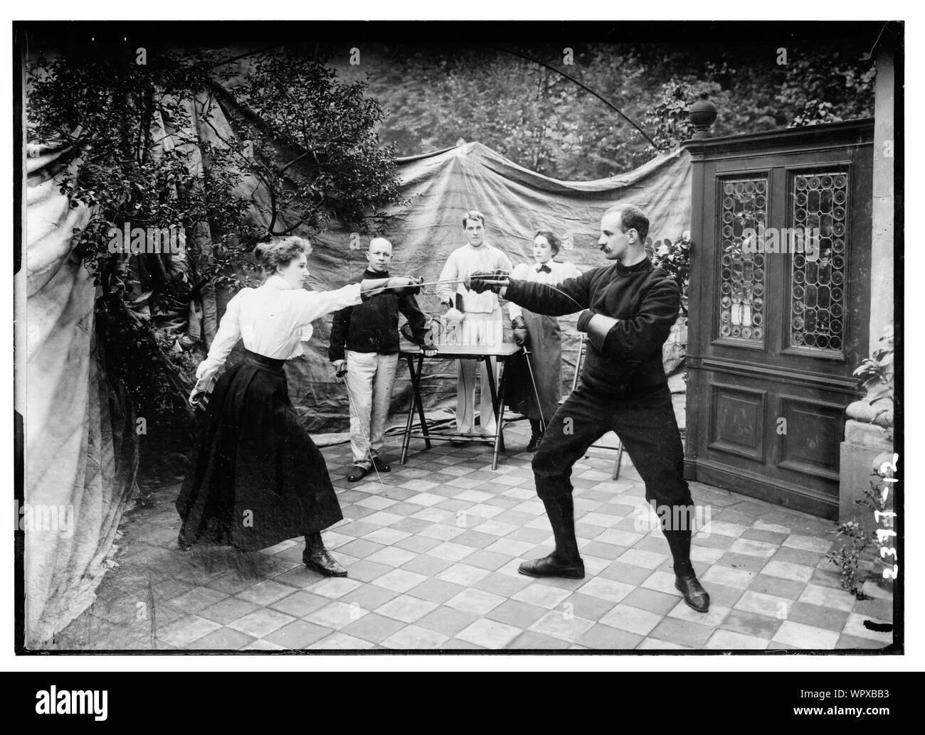 man and woman fencing Stock Photo - Alamy
