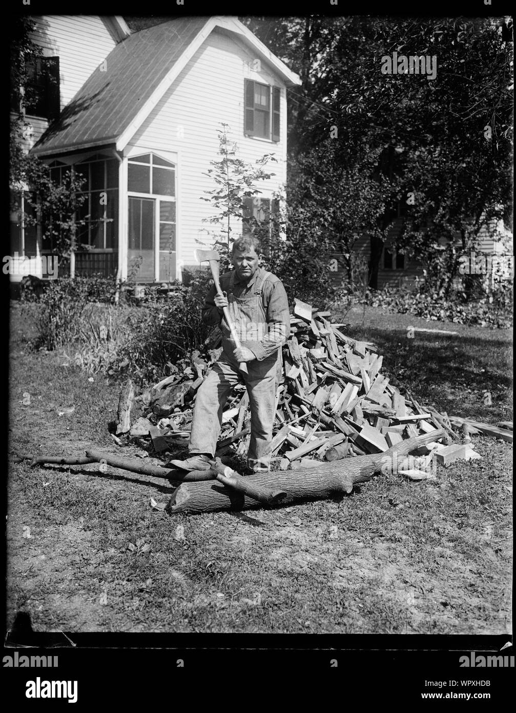 Man chopping wood Black and White Stock Photos & Images - Alamy