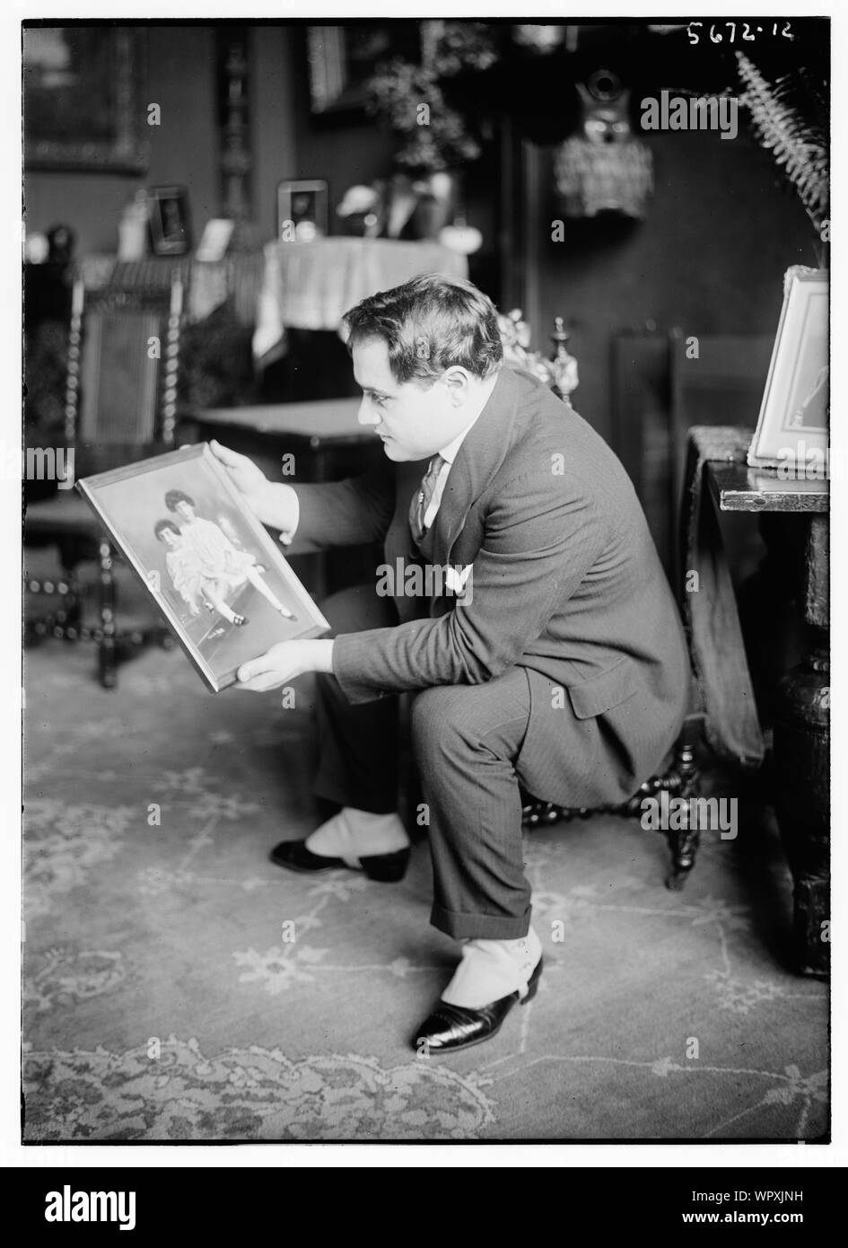 Photo holding Black and White Stock Photos & Images - Alamy