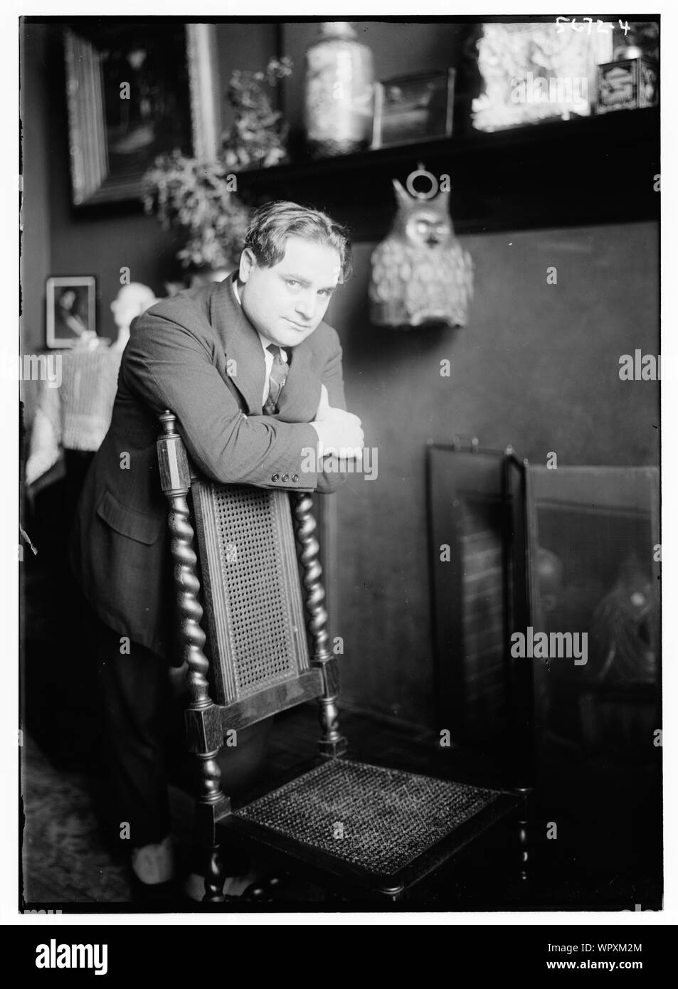 Standing on a chair Black and White Stock Photos & Images - Alamy