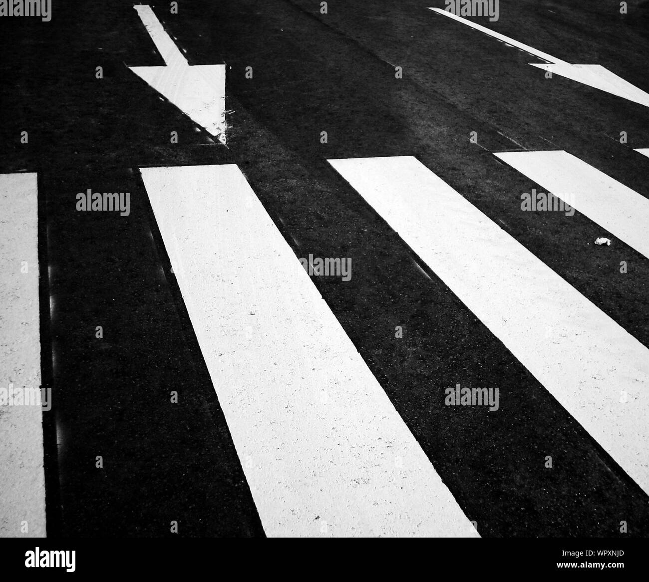 Directional marking Black and White Stock Photos & Images - Alamy