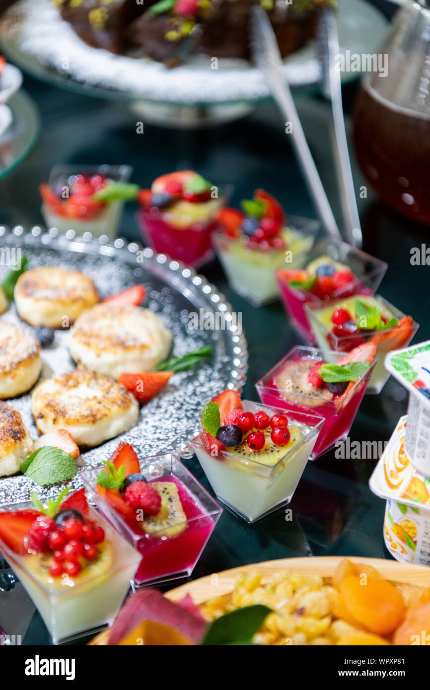 Sweet milk and berry desserts at breakfast buffet in a hotel Stock ...