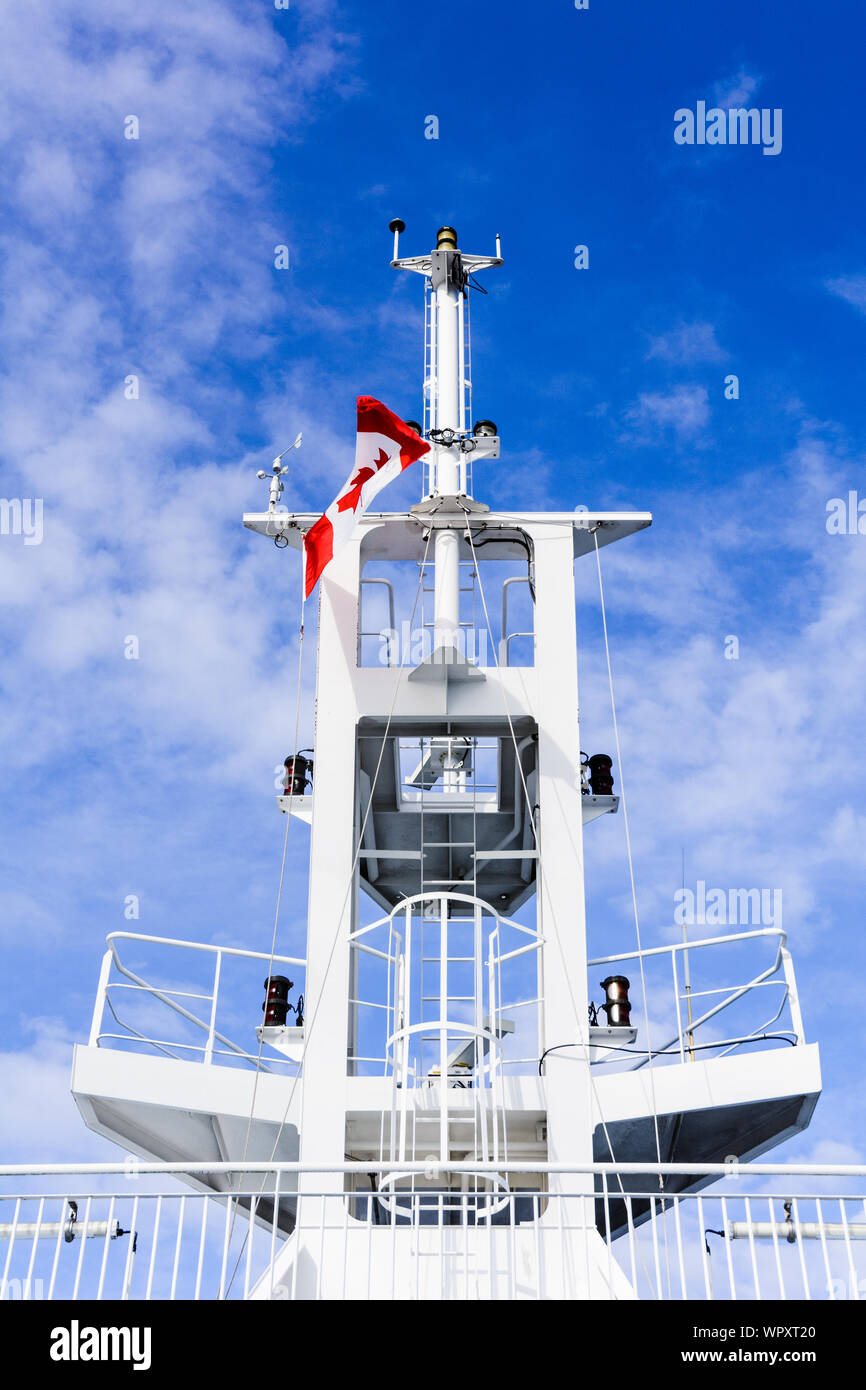 White ship navigation and communication tower mast, rear view from ...