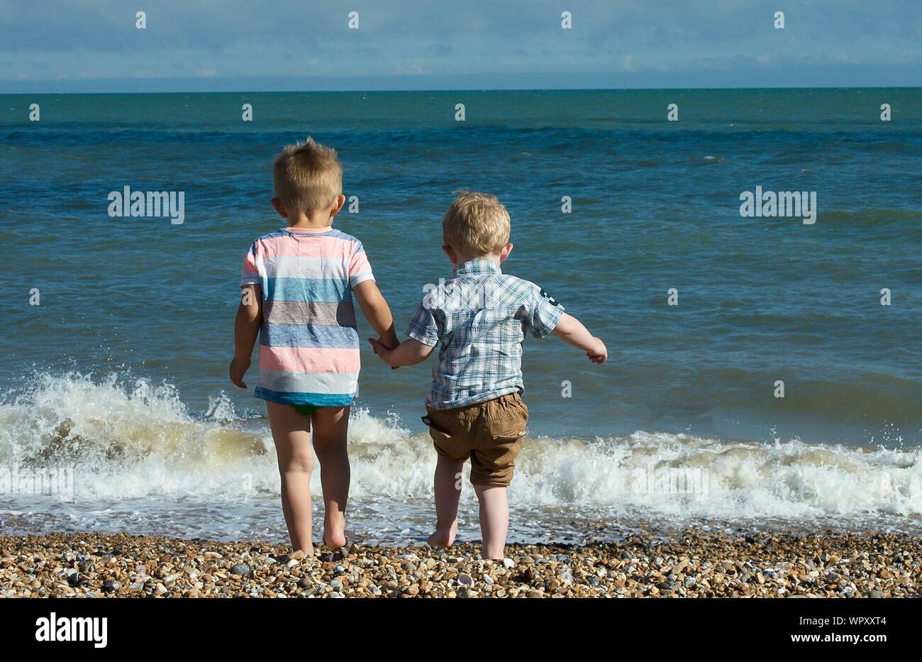 Kids beach hi-res stock photography and images - Alamy
