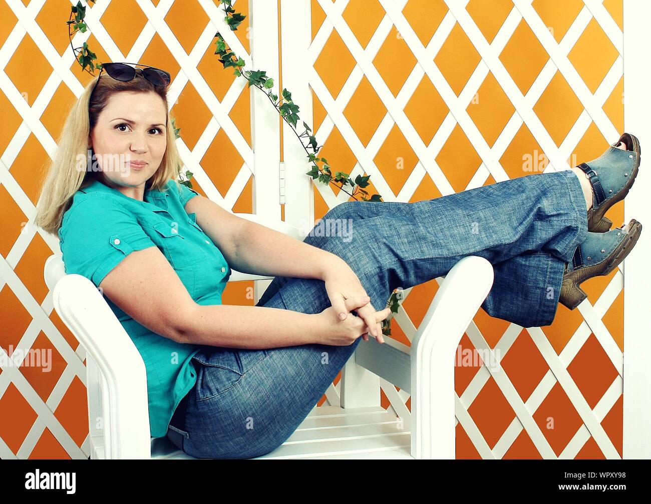 Feet up on chair hi-res stock photography and images - Alamy