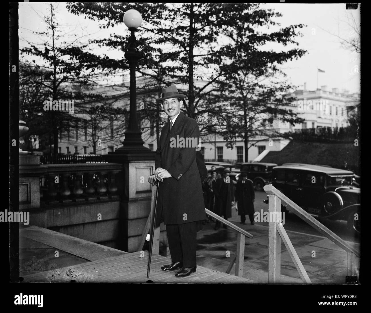 Man about house Black and White Stock Photos & Images - Alamy