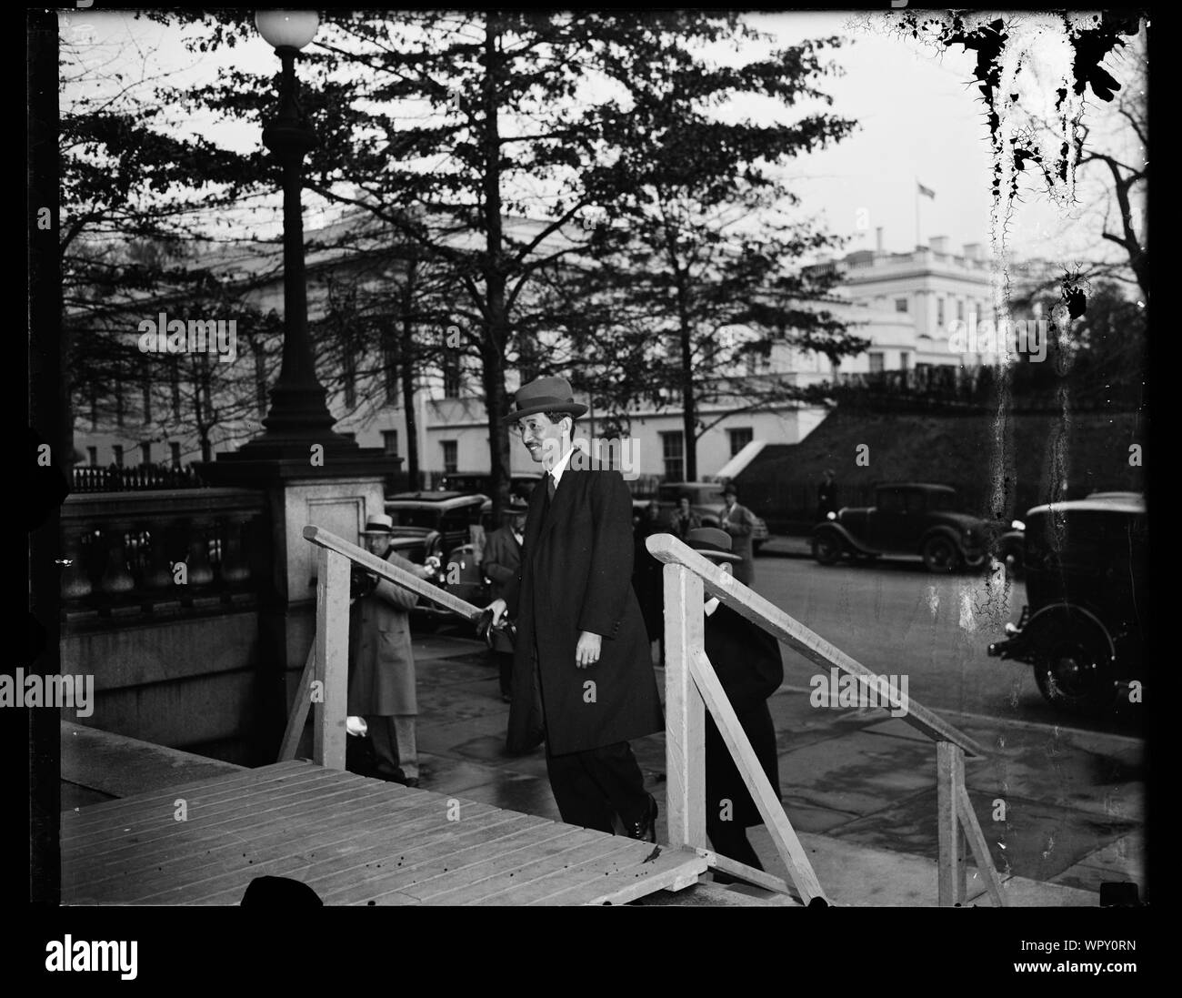 Man about house Black and White Stock Photos & Images - Alamy