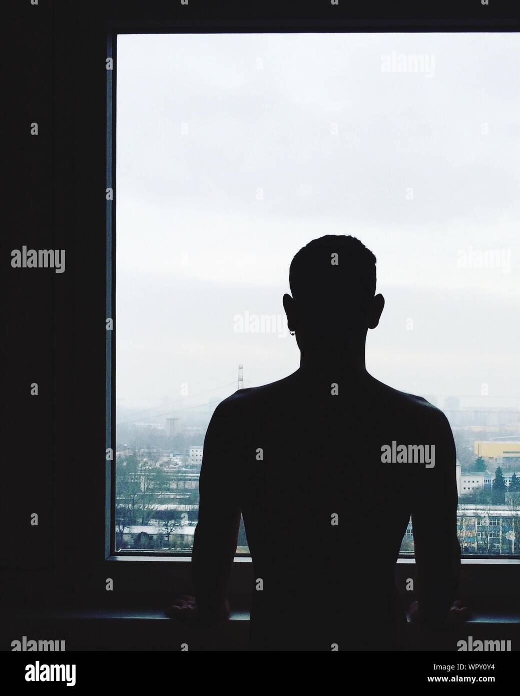 Silhouette Man Standing Glass Window High Resolution Stock Photography ...
