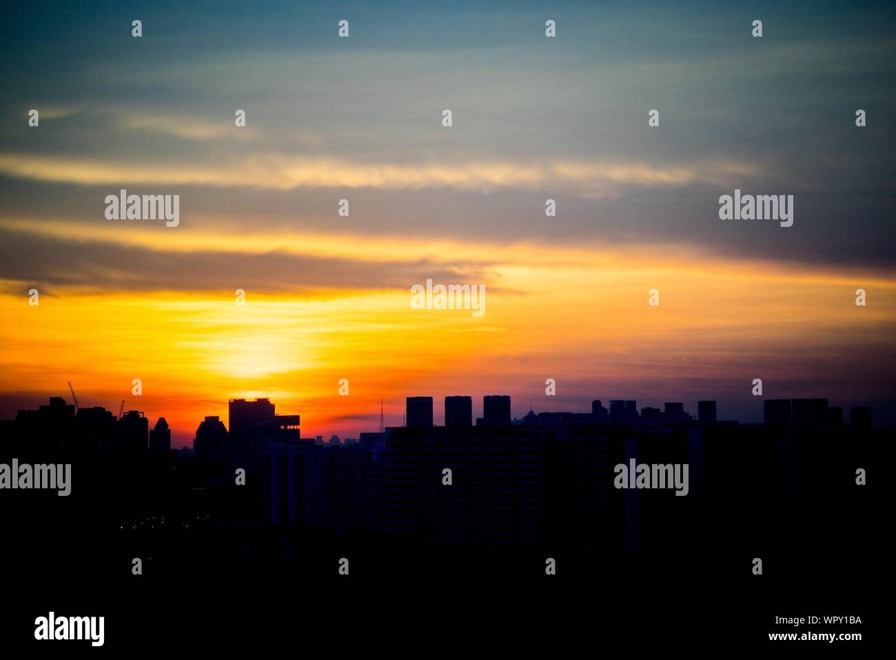 The sunset and high rise building hi-res stock photography and images ...