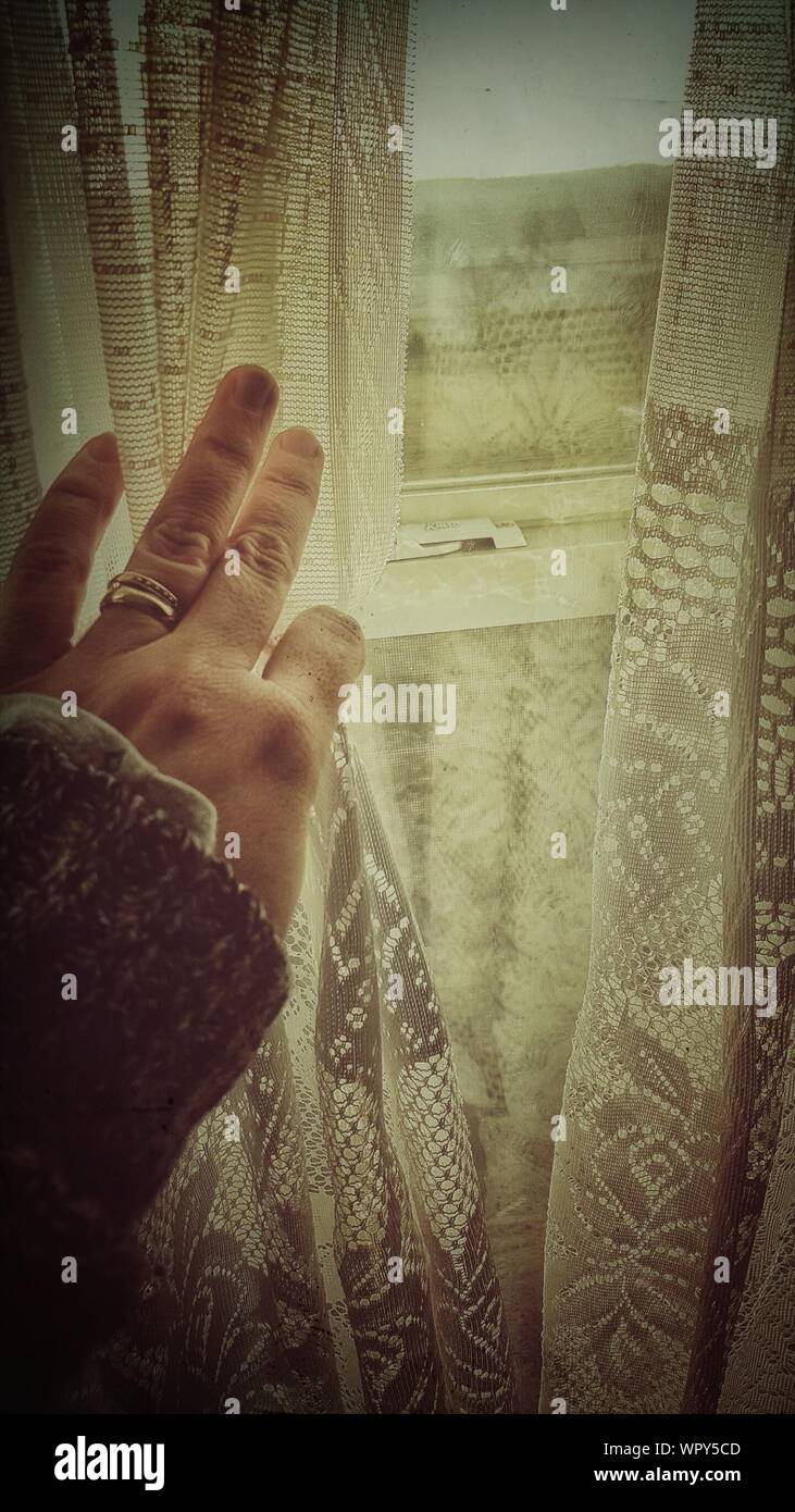 Looking through hand holding hi-res stock photography and images - Alamy