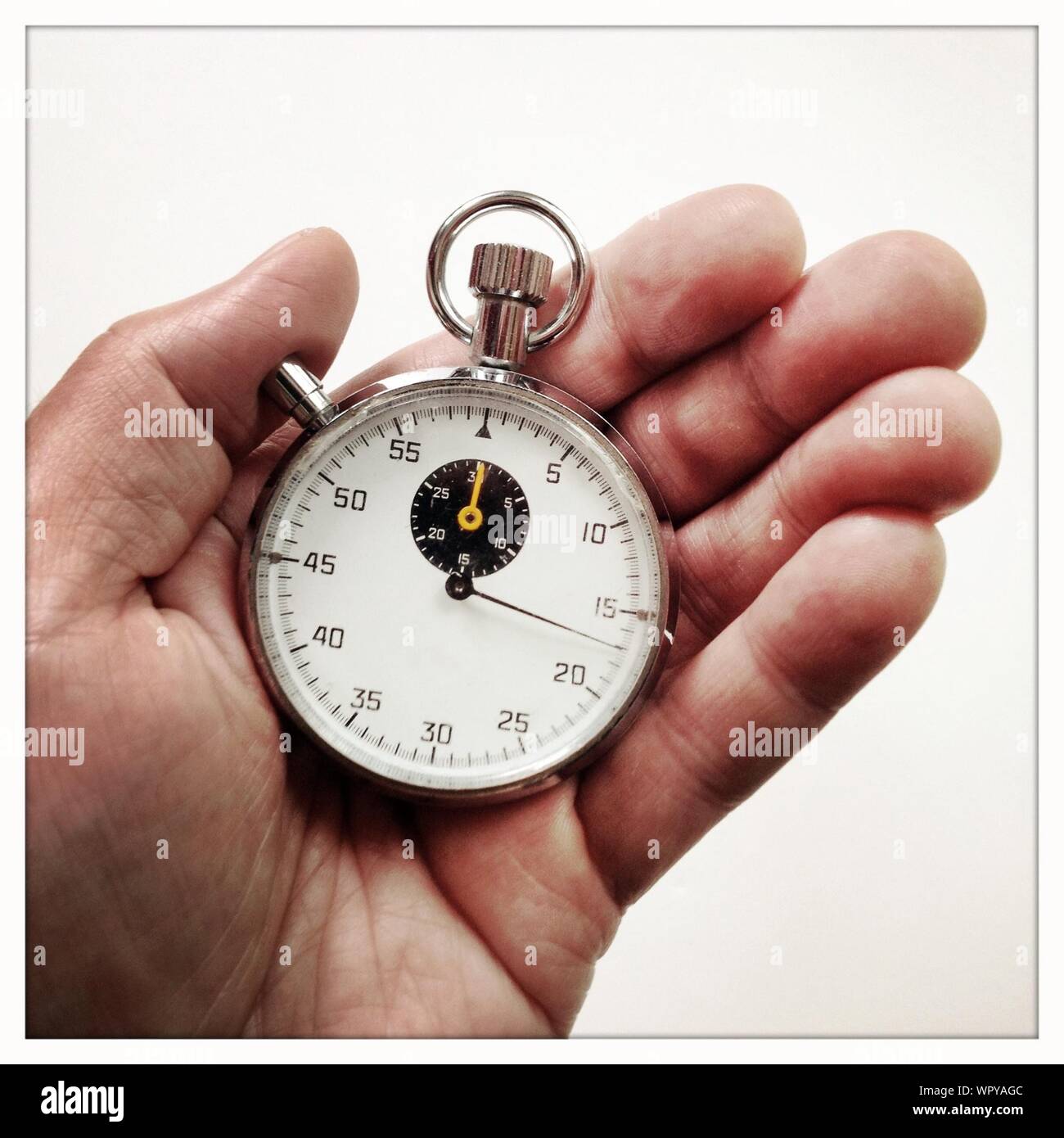 Hand holding watch hi-res stock photography and images - Alamy